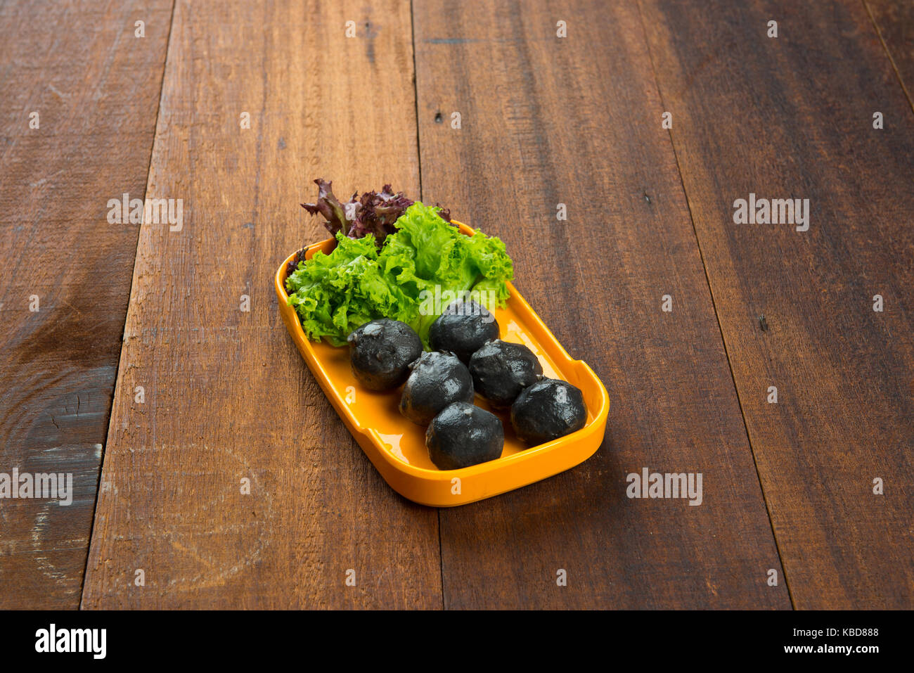 raw black fishball Stock Photo - Alamy
