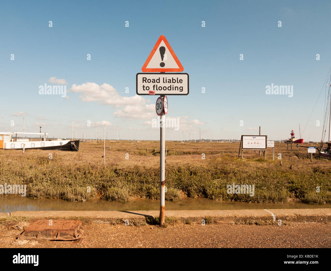 dock road sign red triangle exclamation road liable to flooding; essex ...