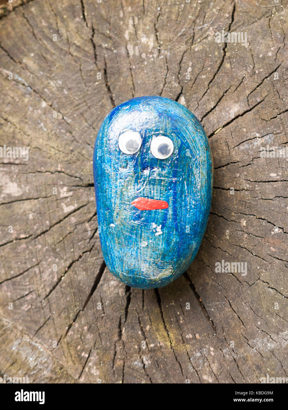 close up of funny cartoon painted children blue stone with eyes; Essex ...