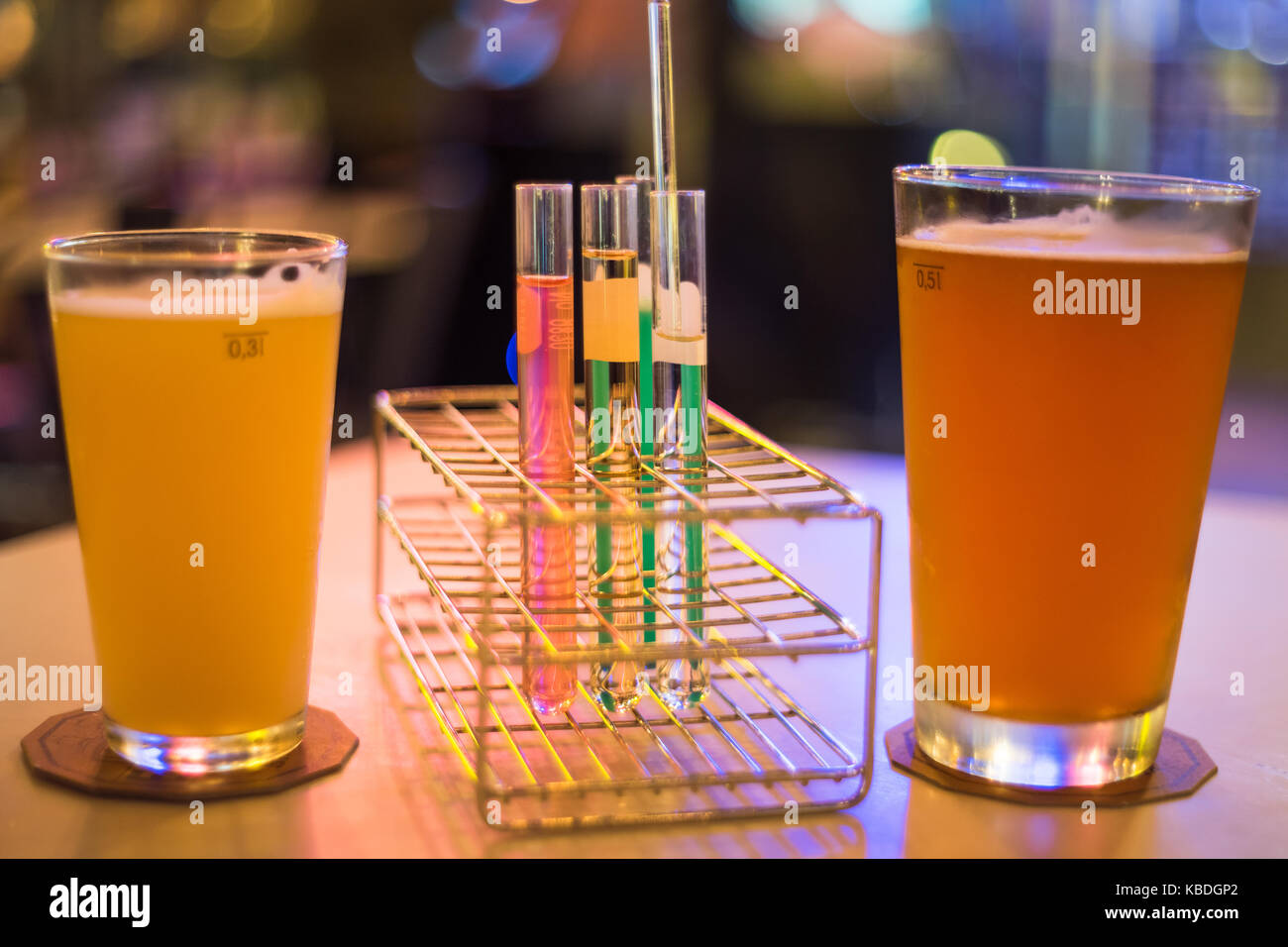 beer cocktail with fruits syrup in test tube Stock Photo - Alamy