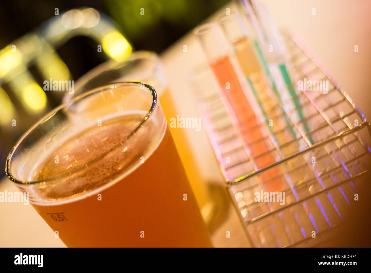 beer cocktail with fruits syrup in test tube Stock Photo - Alamy