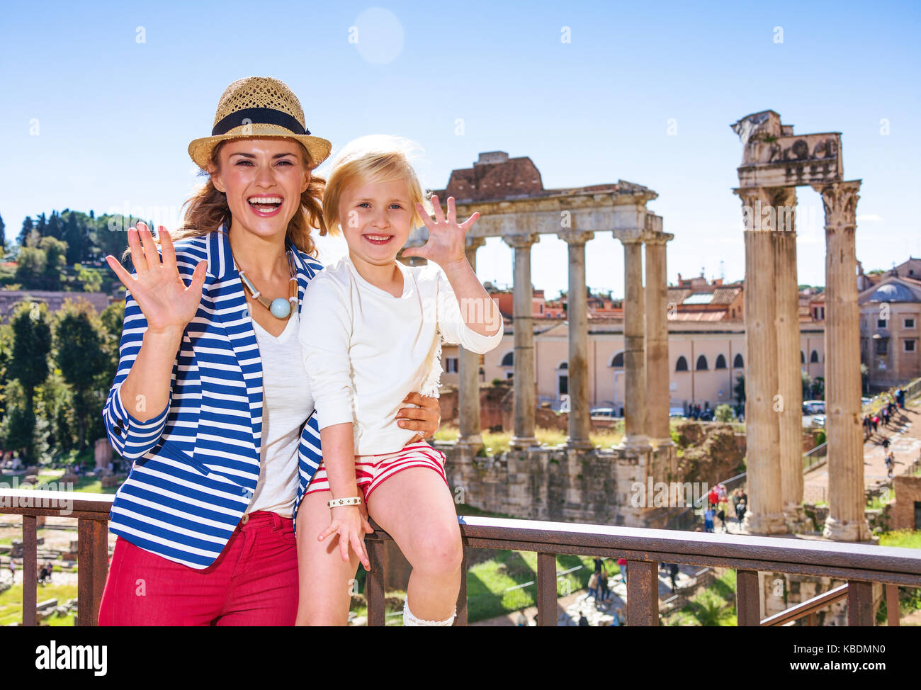 Roman Holiday. smiling modern mother and child tourists near Roman ...