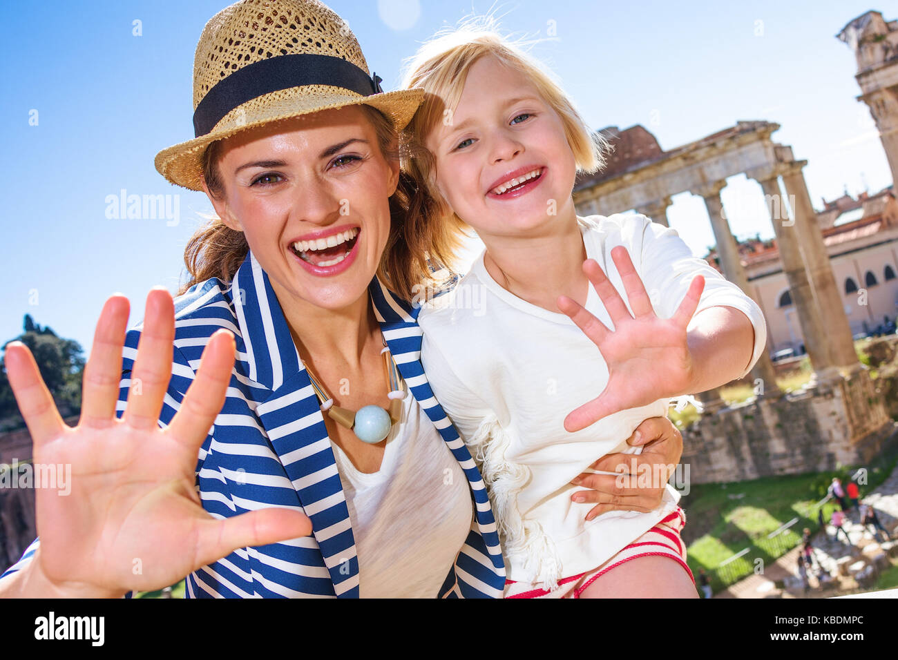 Roman Holiday. smiling stylish mother and daughter travellers in the ...