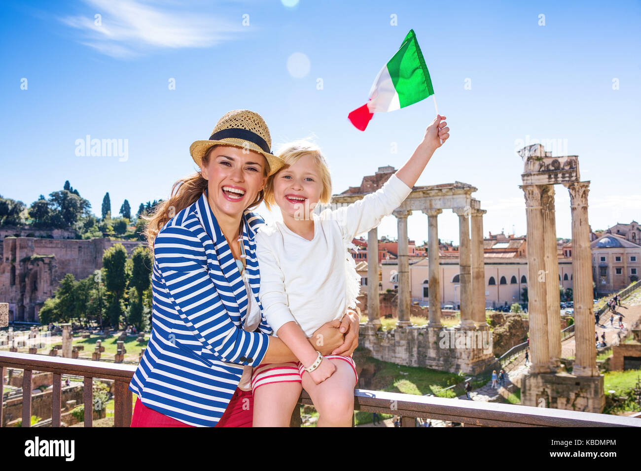 Roman Holiday. smiling modern mother and child tourists in the front of ...