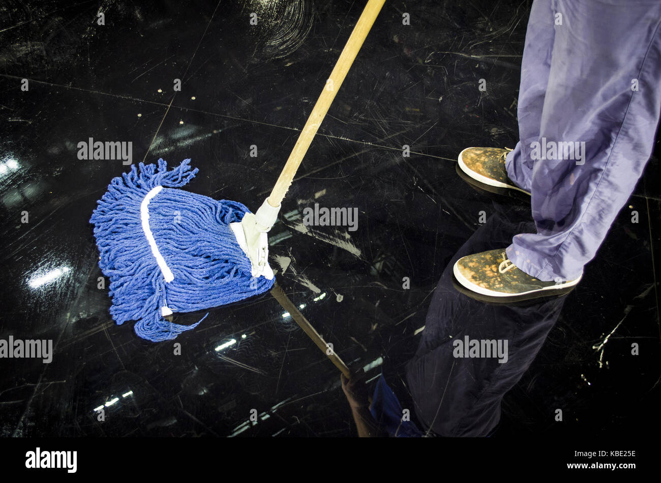 Mop and bucket man hi-res stock photography and images - Alamy