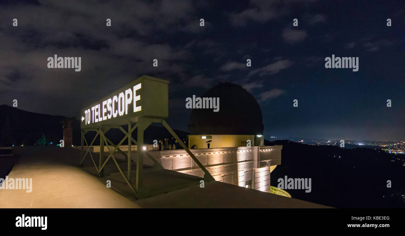 A sign points the way to one of the telescopes at the Griffith ...