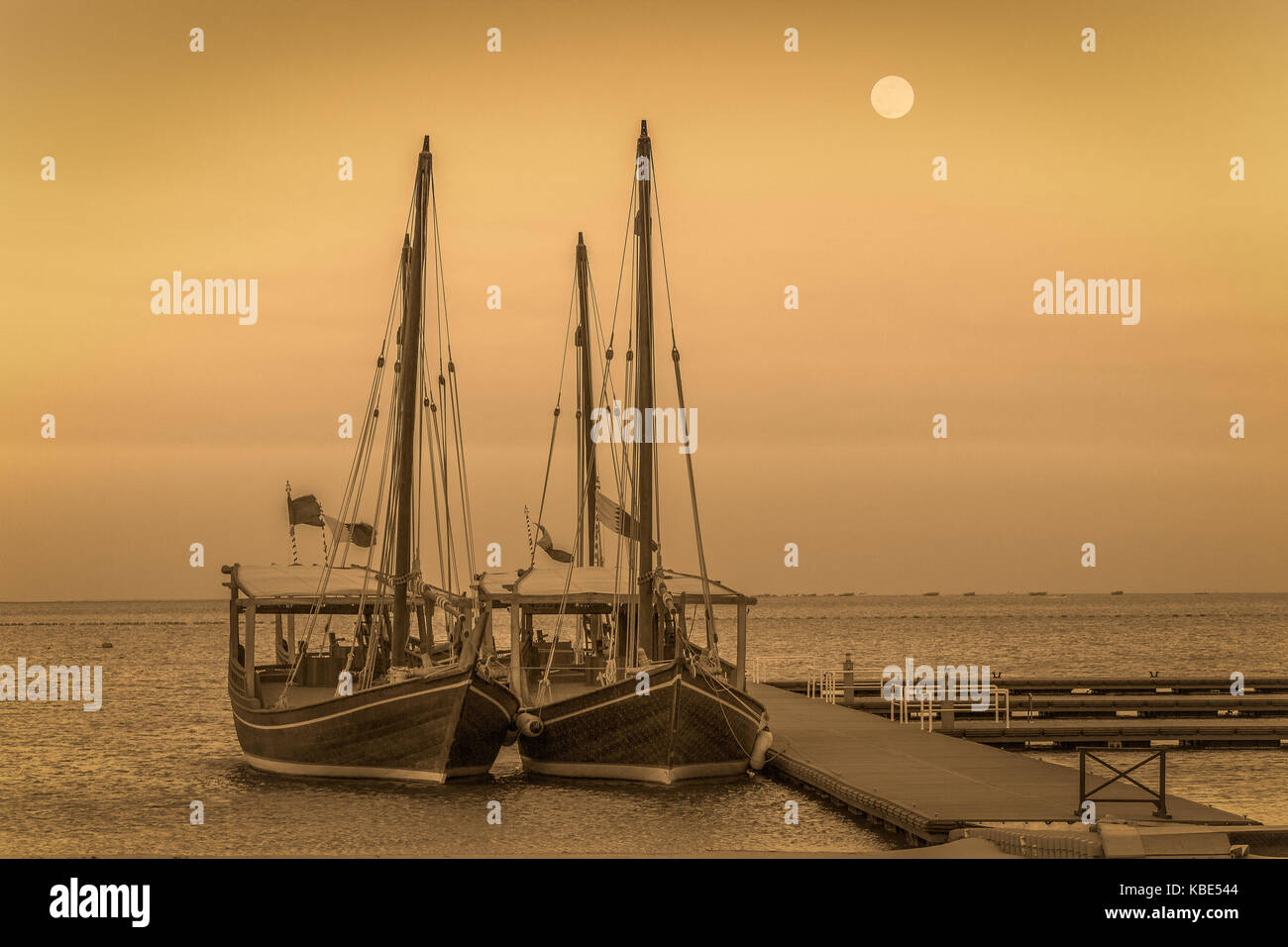 Traditional wooden boats (dhow, old Arabic boats) in Arabic gulf Stock ...
