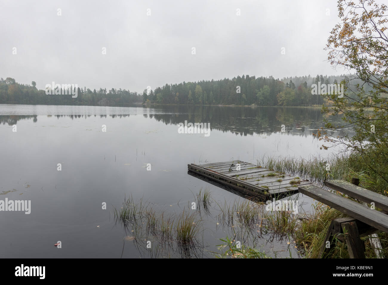 Jetty by a lake Stock Photo - Alamy