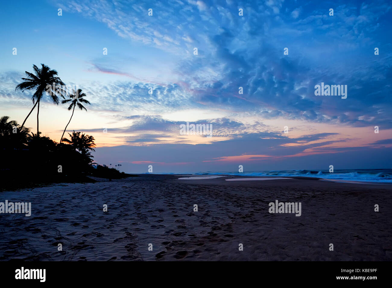 Tropical sunset or dusk Stock Photo - Alamy