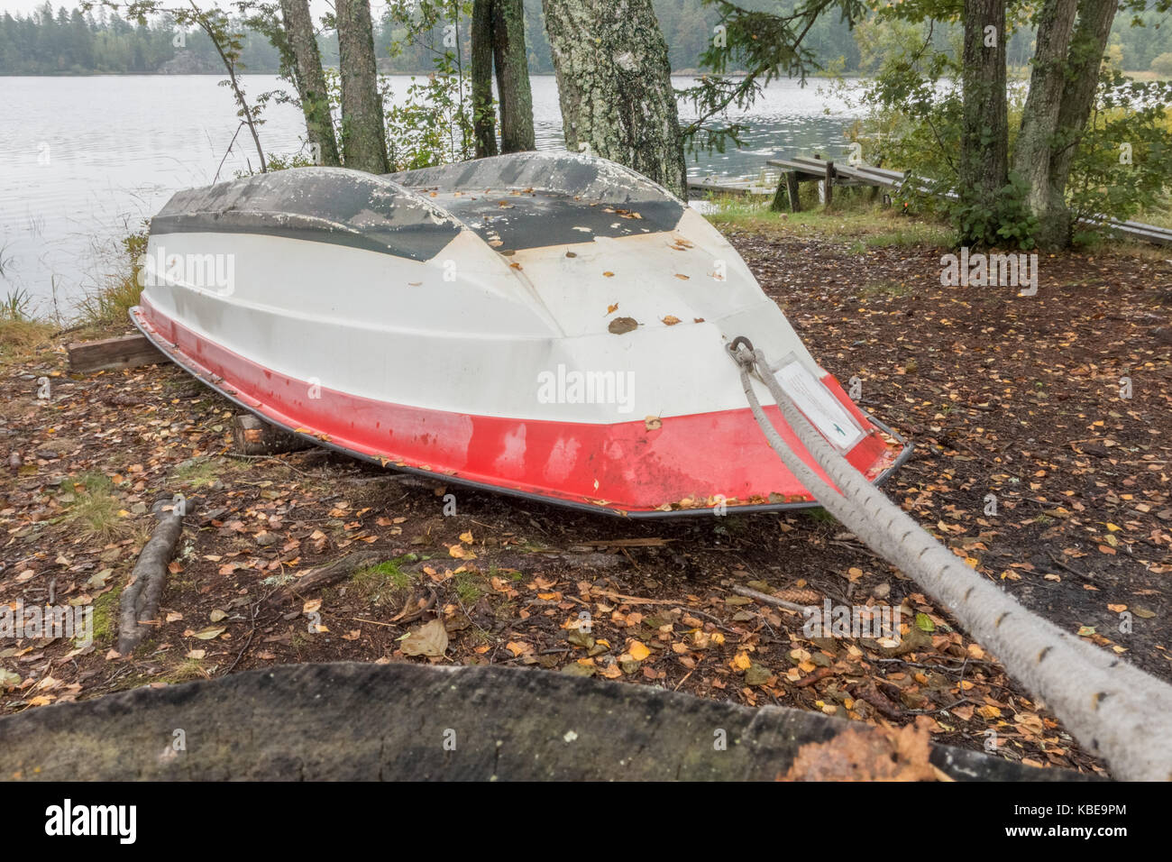 Row boat in winter storage Stock Photo - Alamy