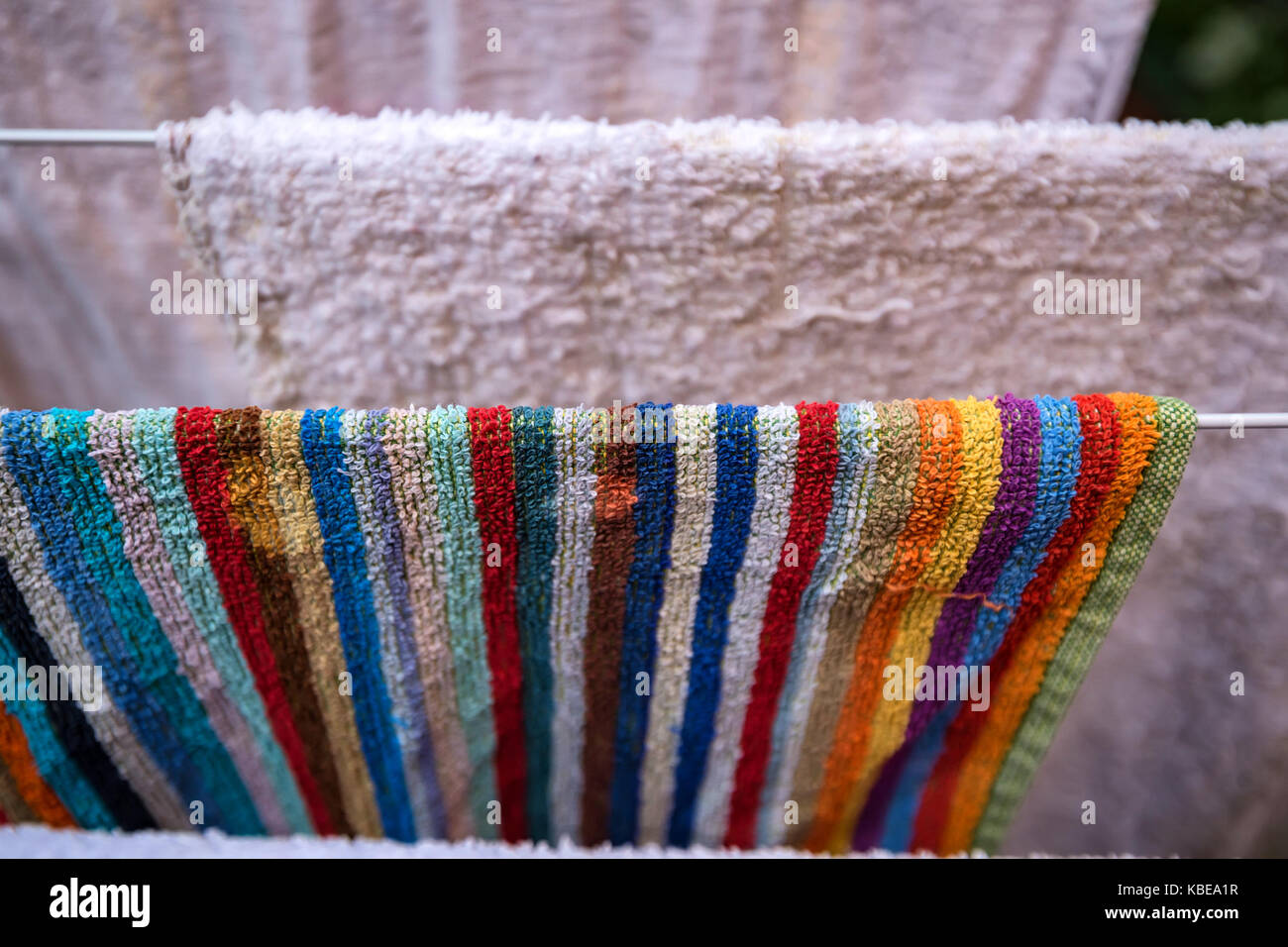 Close up colorful laundry drying Stock Photo - Alamy