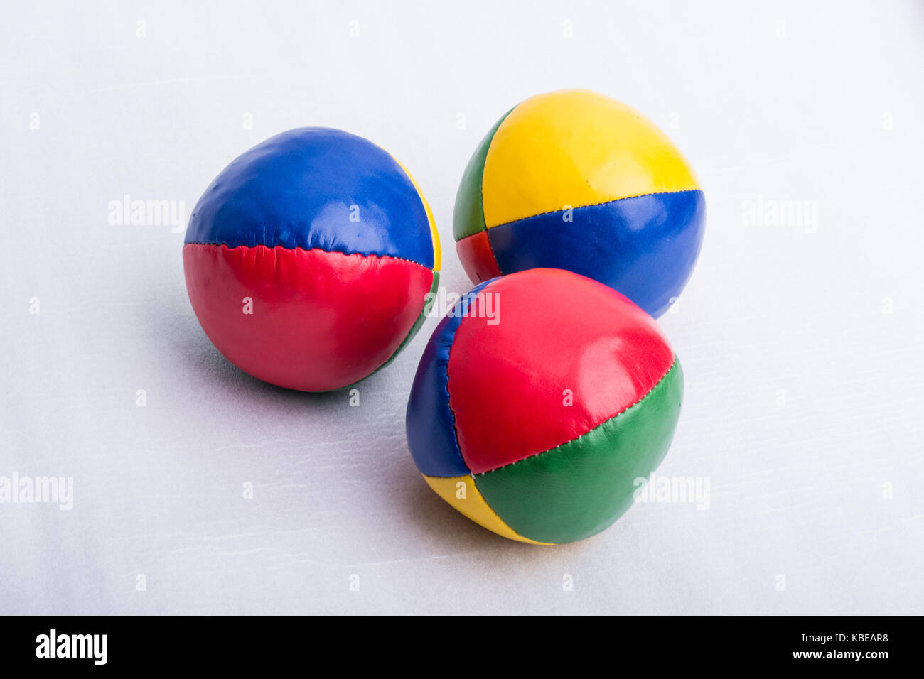 A set of three colorful juggling balls on a white surface Stock Photo ...