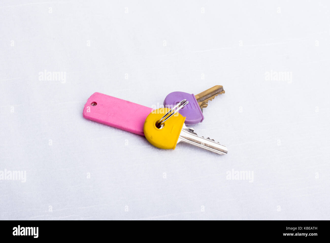 Purple house keys key ring hi-res stock photography and images - Alamy