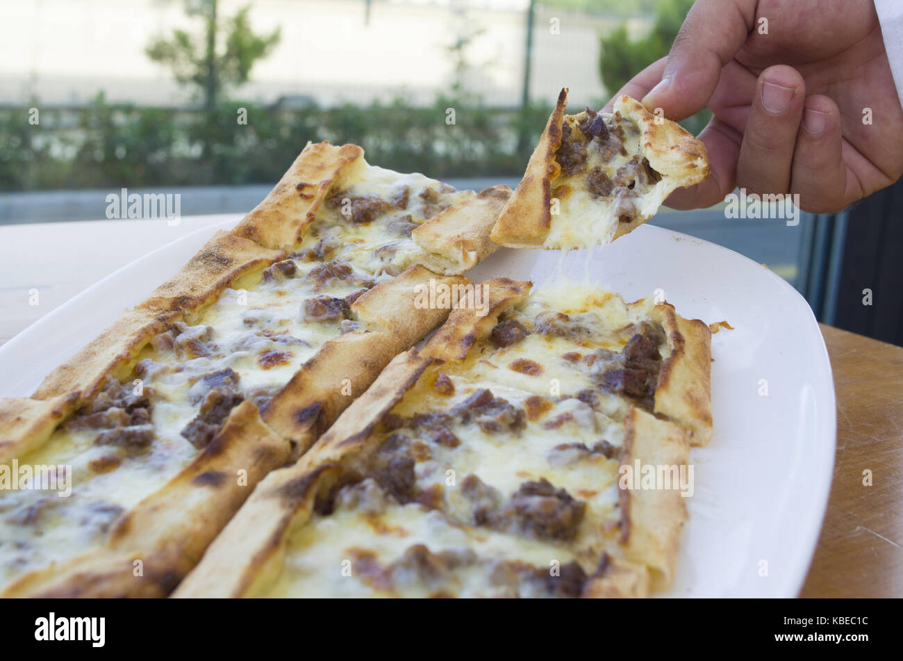 turkish traditional pita pide cheese and meat Stock Photo - Alamy