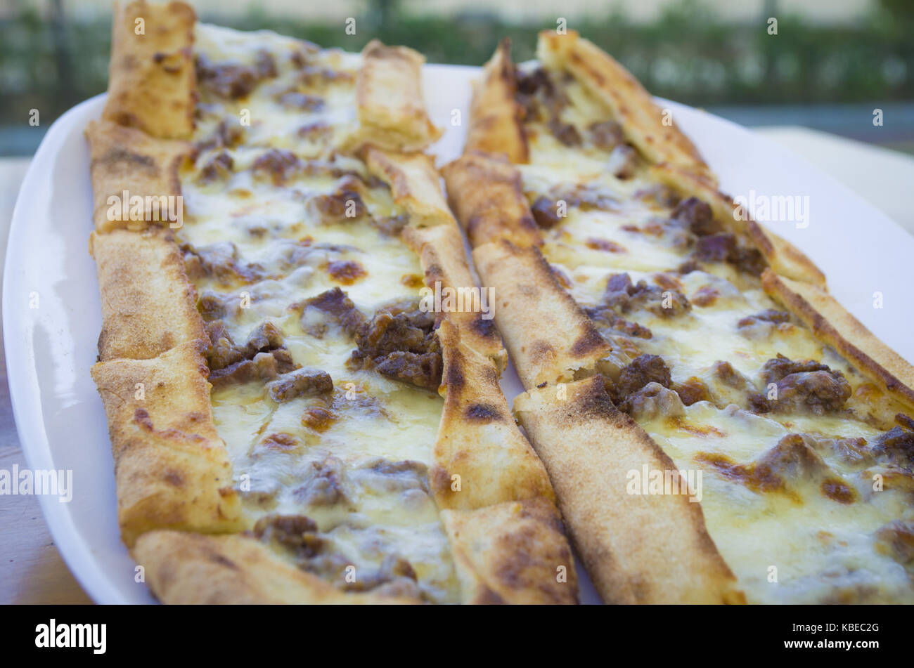 turkish traditional pita pide cheese and meat Stock Photo - Alamy