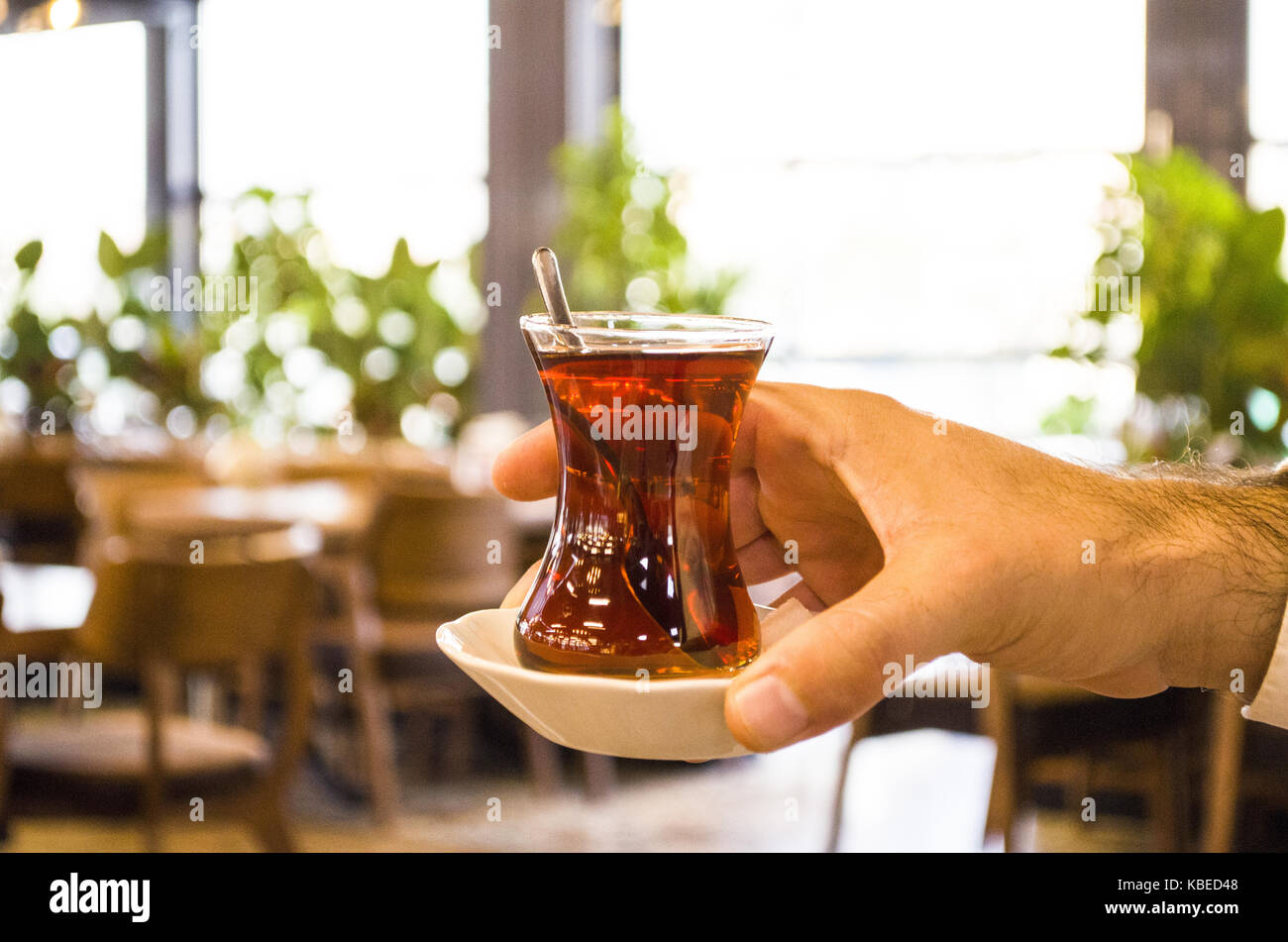 Turkish tea cup holding hi-res stock photography and images - Alamy