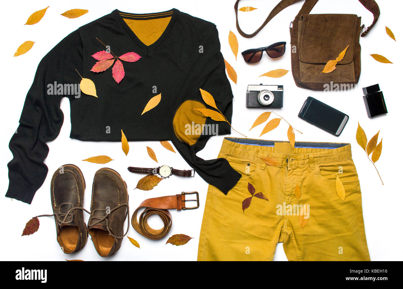 Autumn male fashion accessories and fallen leafs Stock Photo - Alamy