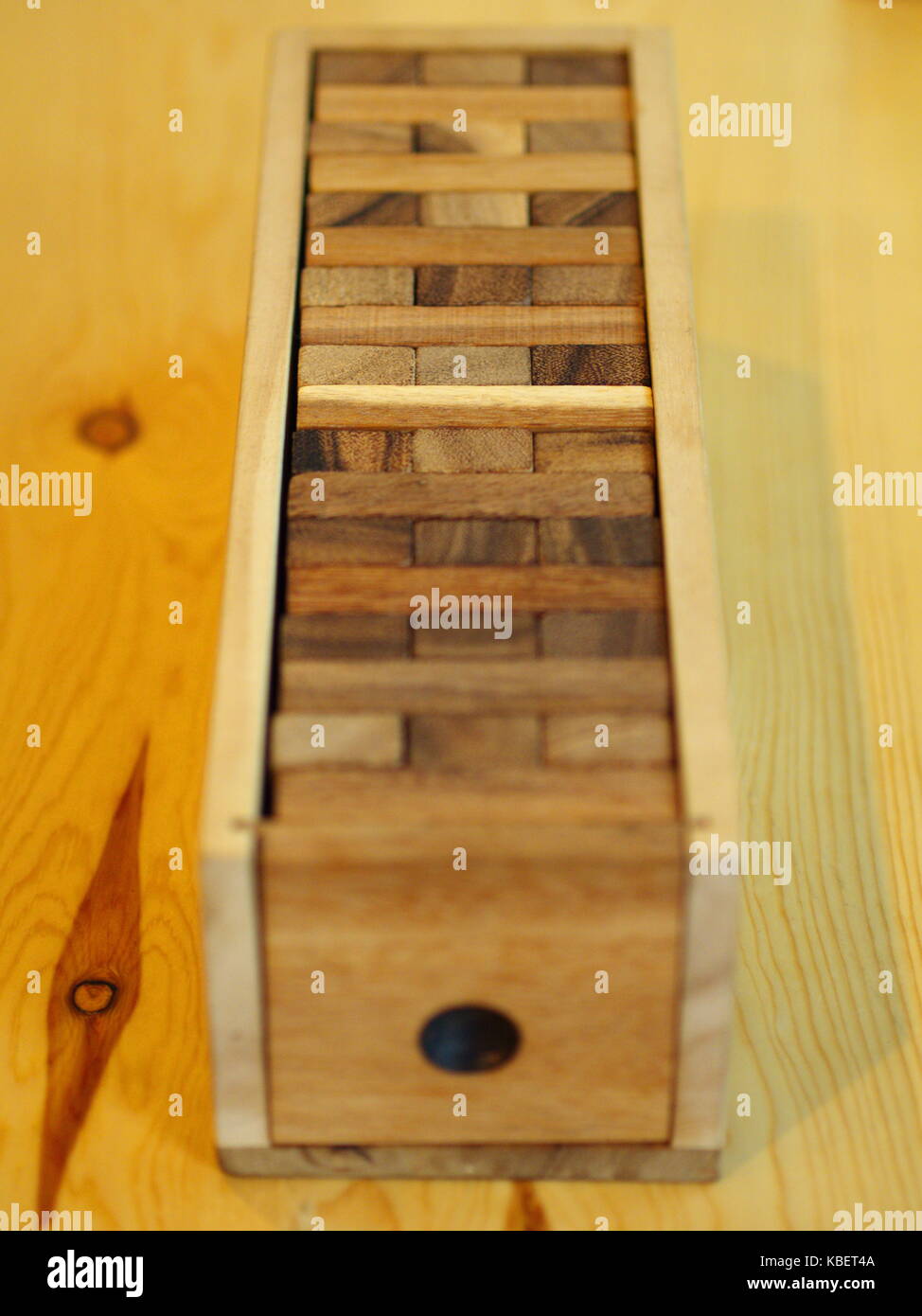 a Wooden Block Game. Wood Tower Contruction Cube Toy Stock Photo - Alamy
