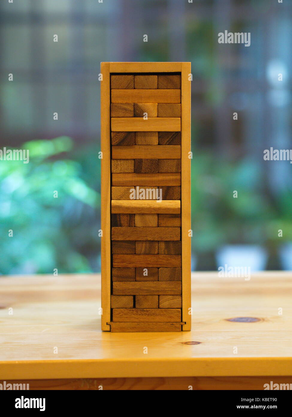 a Wooden Block Game. Wood Tower Contruction Cube Toy Stock Photo - Alamy