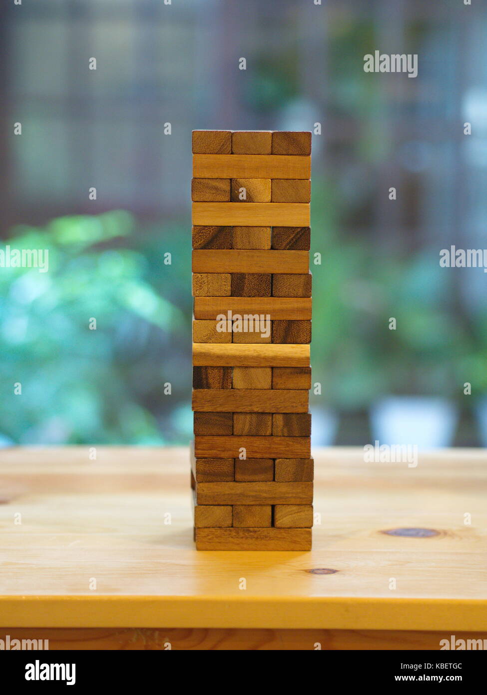 a Wooden Block Game. Wood Tower Contruction Cube Toy Stock Photo - Alamy