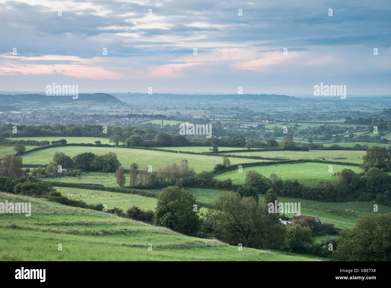 Beautiful sunrise landscape over Somerset Levels in English countryside ...