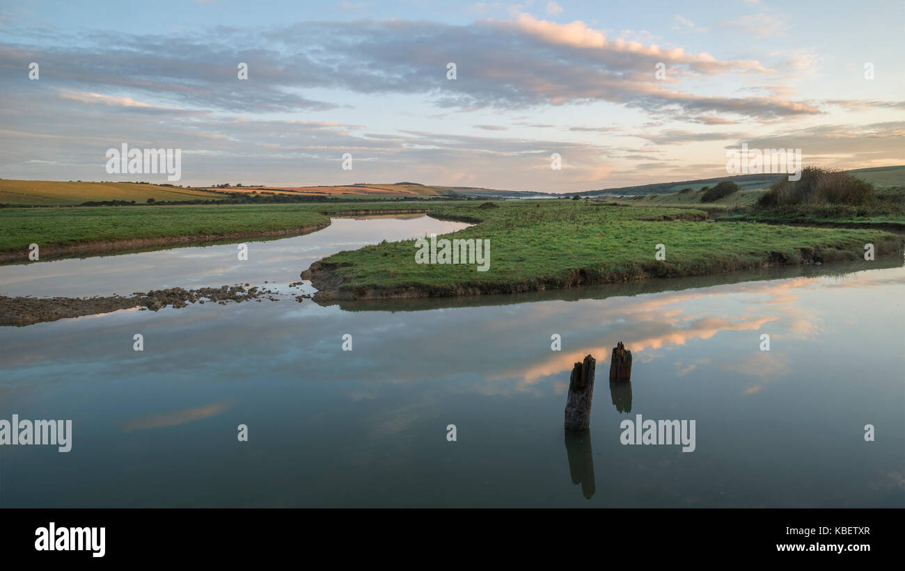 Beautiful sunrise landscape over English countryside with river slowly ...