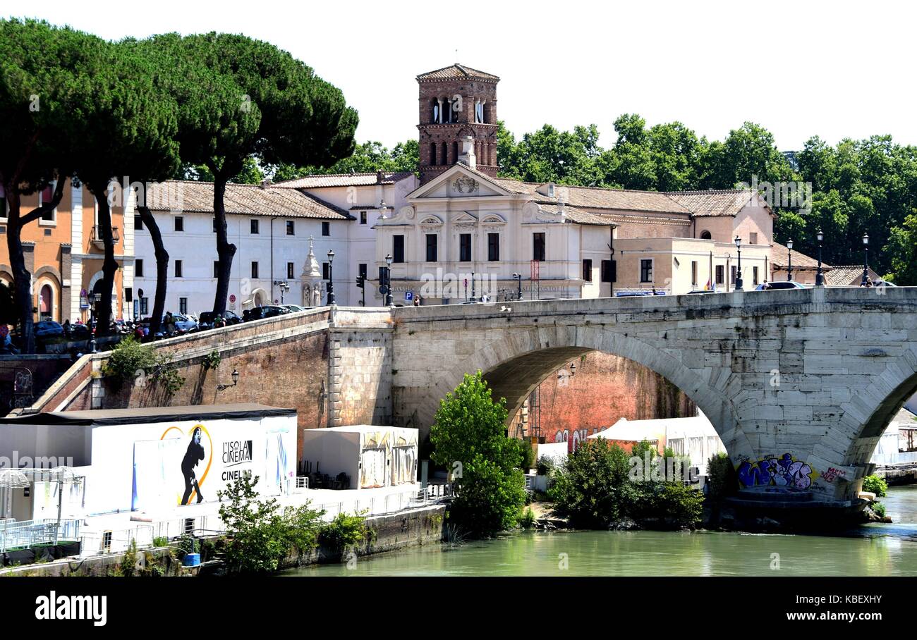 Bridge Ponte Cestio and church Basilica di San Bartolomeo in Rome ...