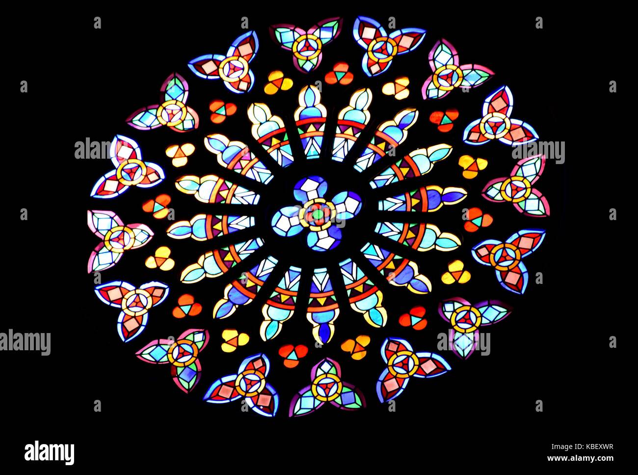 A colorful window of the catholic church Eglesia de Sant Miquel in the ...