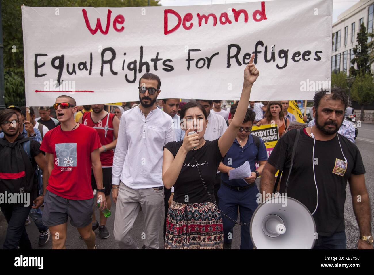 Afghan refugees rally in Athens, demaning equal rights and status as ...
