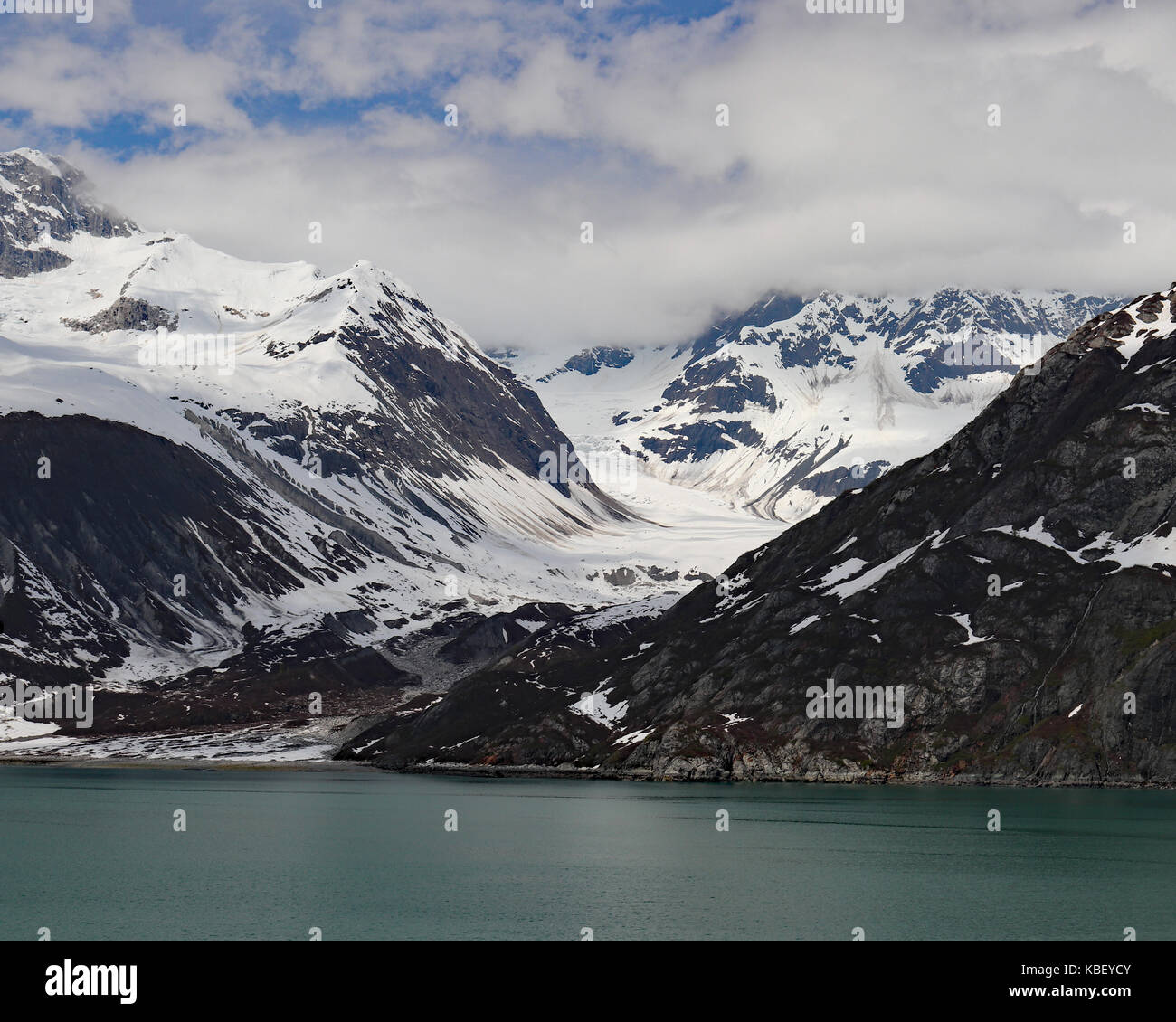 Snow sits on the mountains surrounding John Hopkins inlet even in late ...