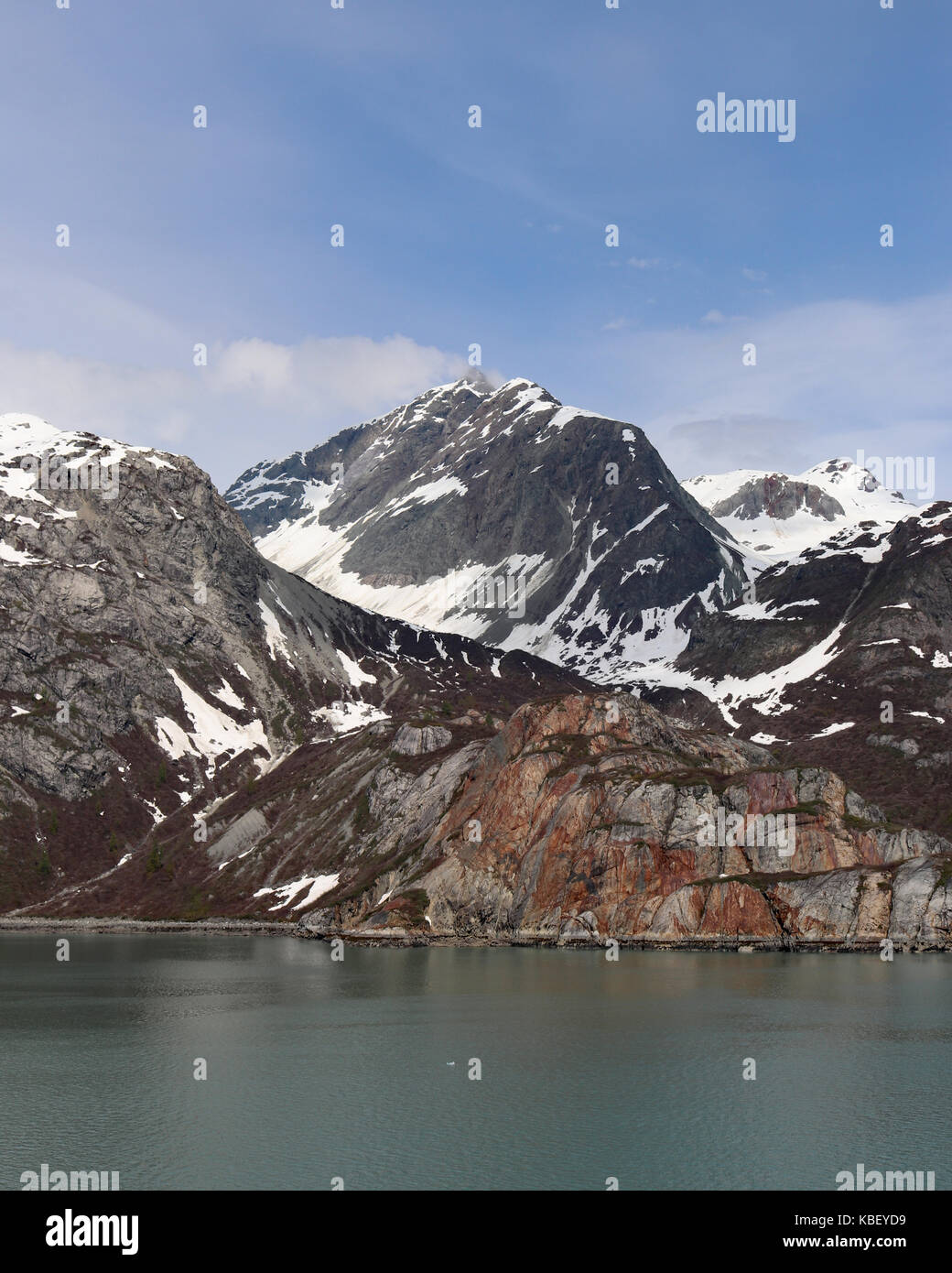 Mountains with rust colored rocks in Glacier Bay National Park and ...