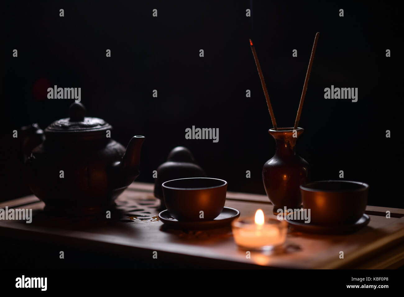 Tea ceremony with candles Stock Photo - Alamy