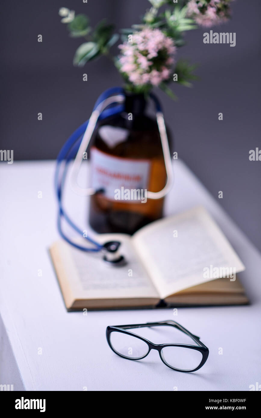 Stethoscope and book on Desk Stock Photo - Alamy