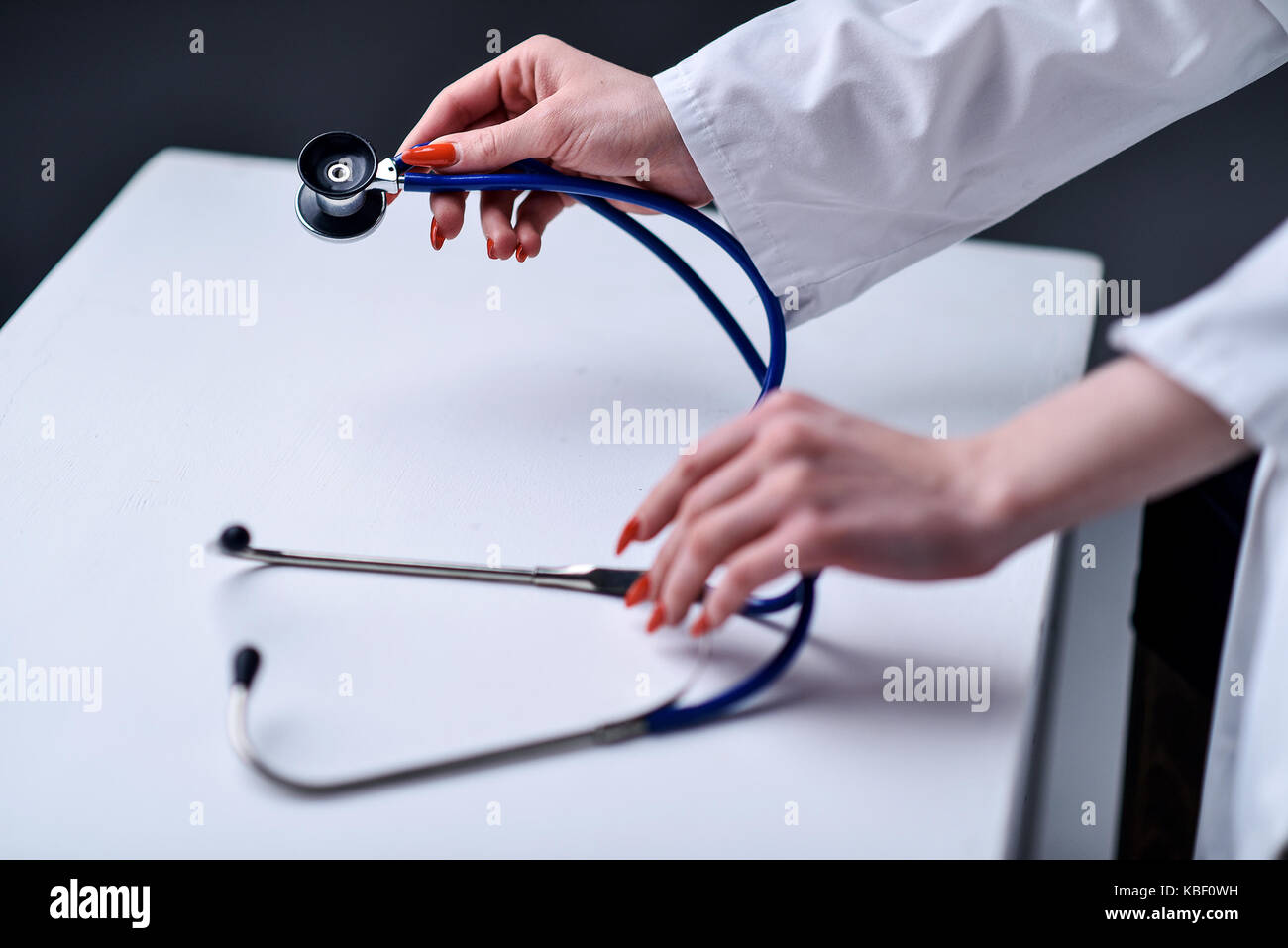 A stethoscope in the hands Stock Photo - Alamy