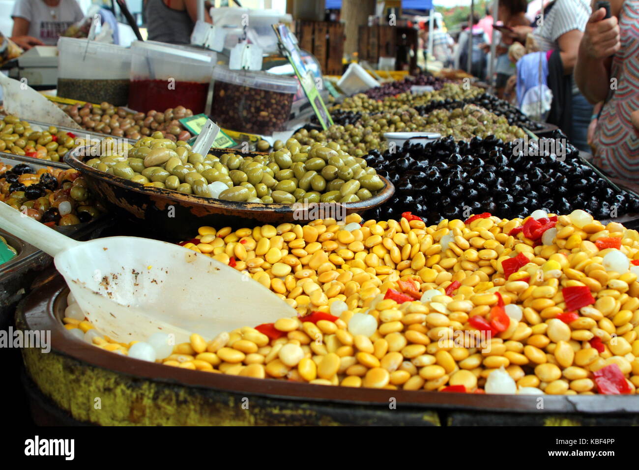 Large range of olives for sale at an open air market in the South of ...