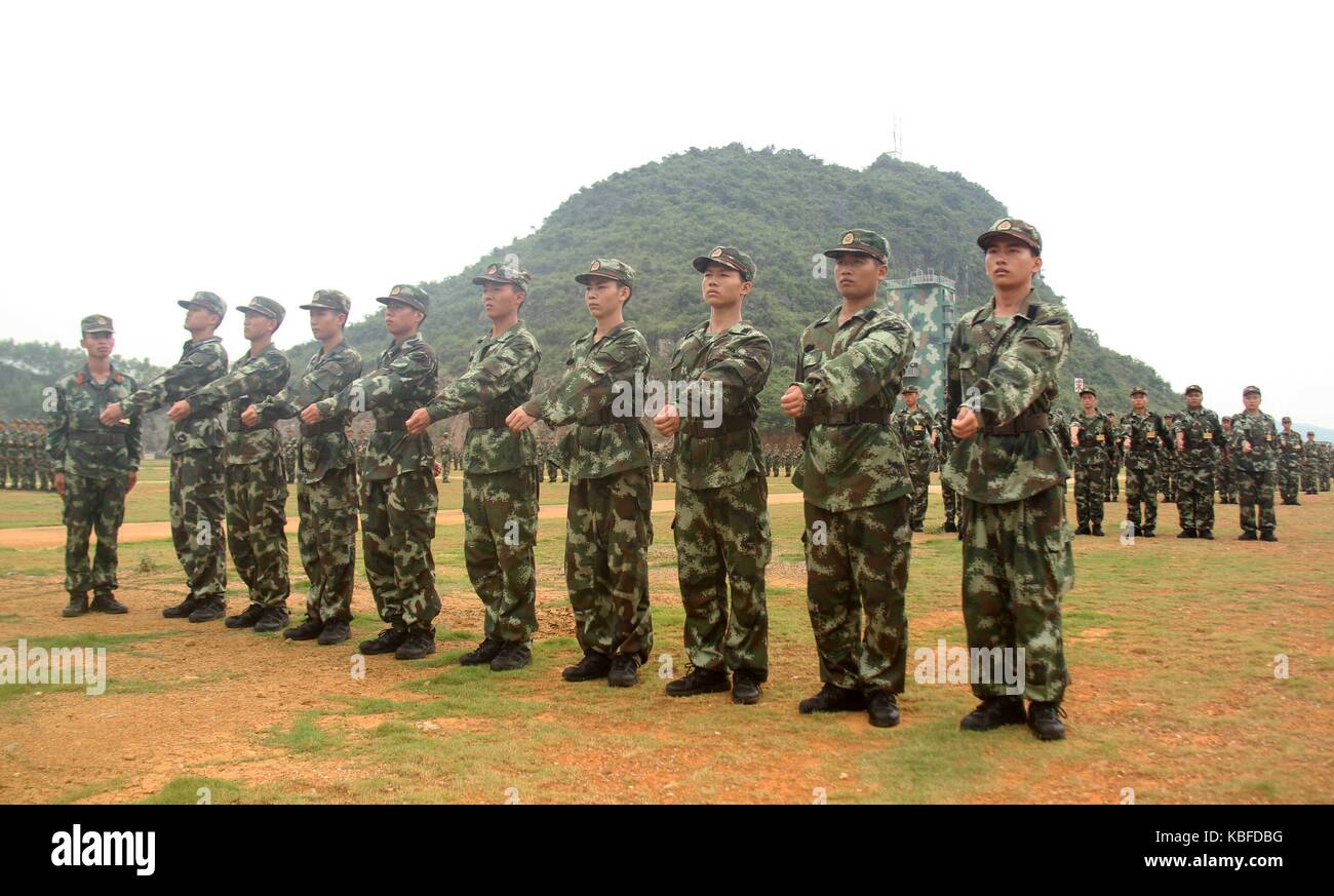 Chongzuo, China. 29th Sep, 2017. New soldiers receive military training ...