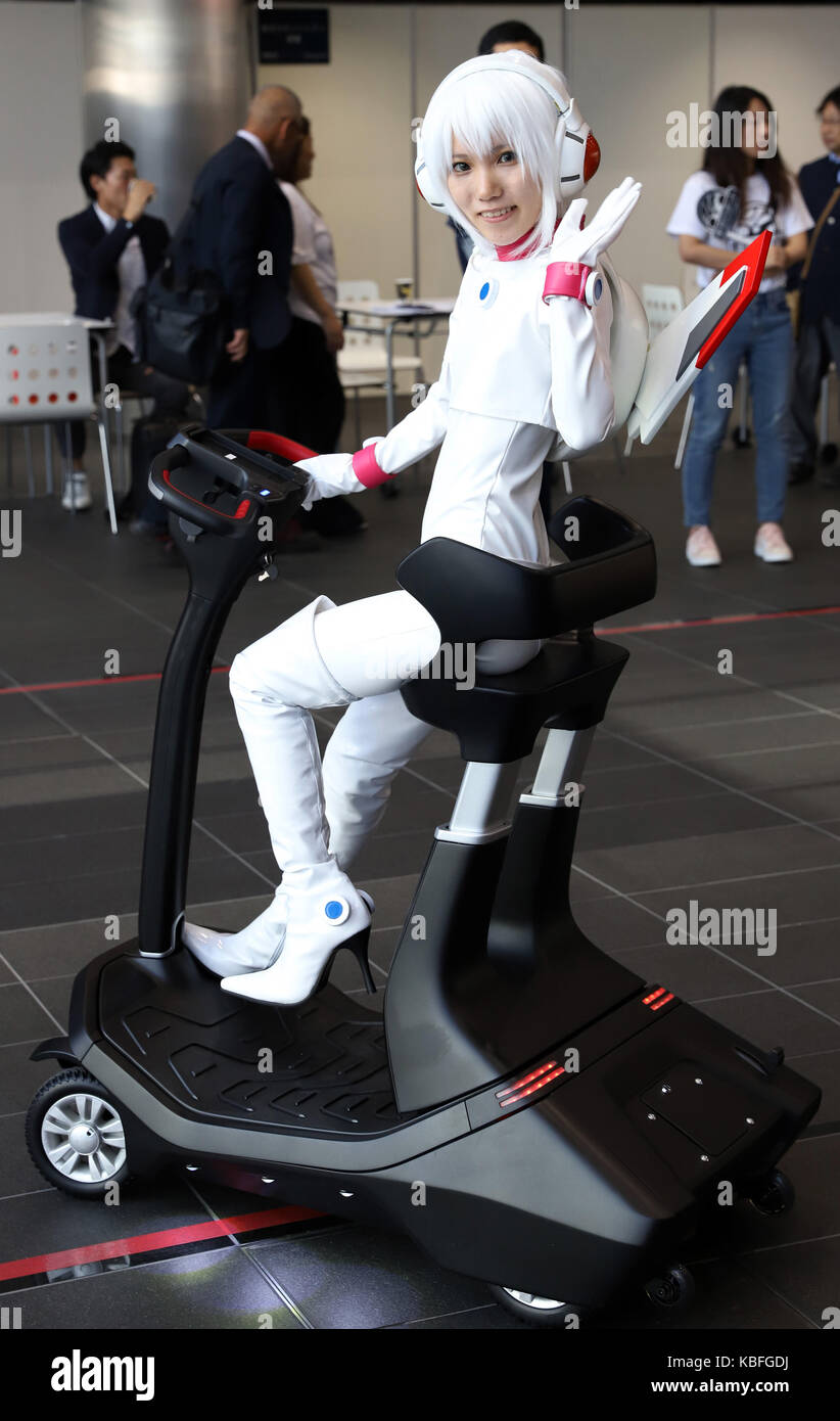 Tokyo, Japan. 29th Sep, 2017. A model displays an eleectric personal ...
