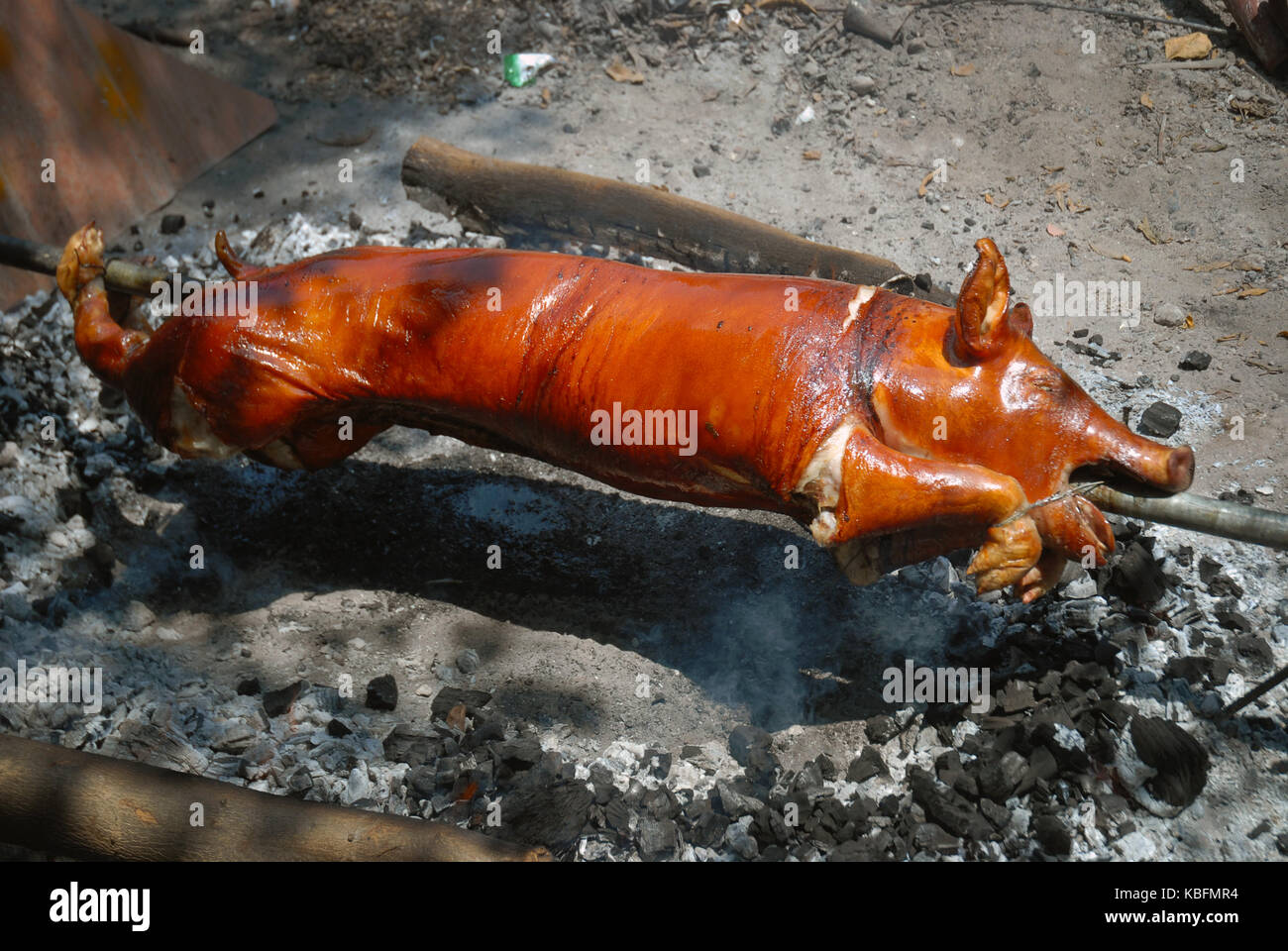 Pig on a spit hi-res stock photography and images - Alamy