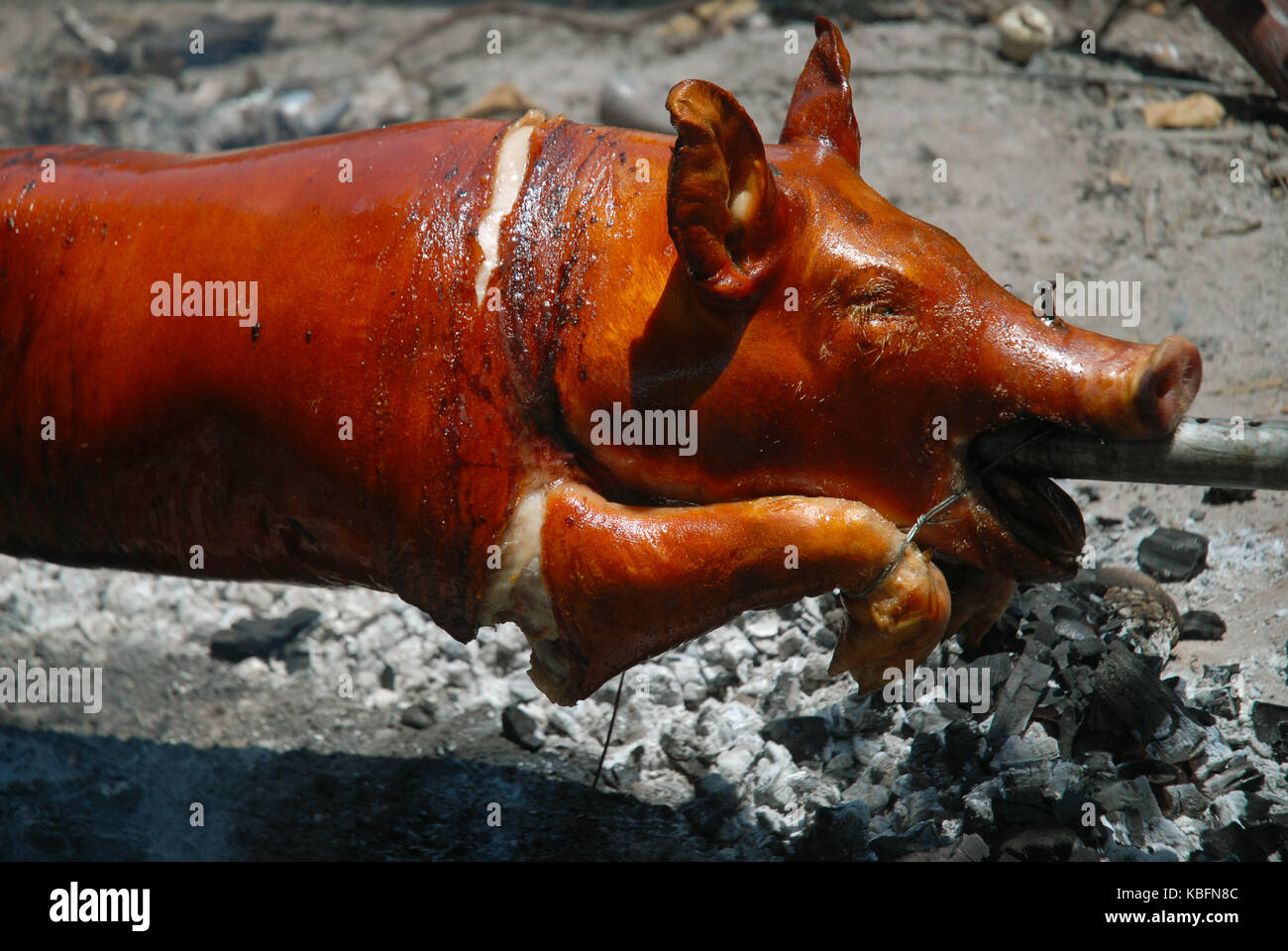 Pig on a spit hi-res stock photography and images - Alamy