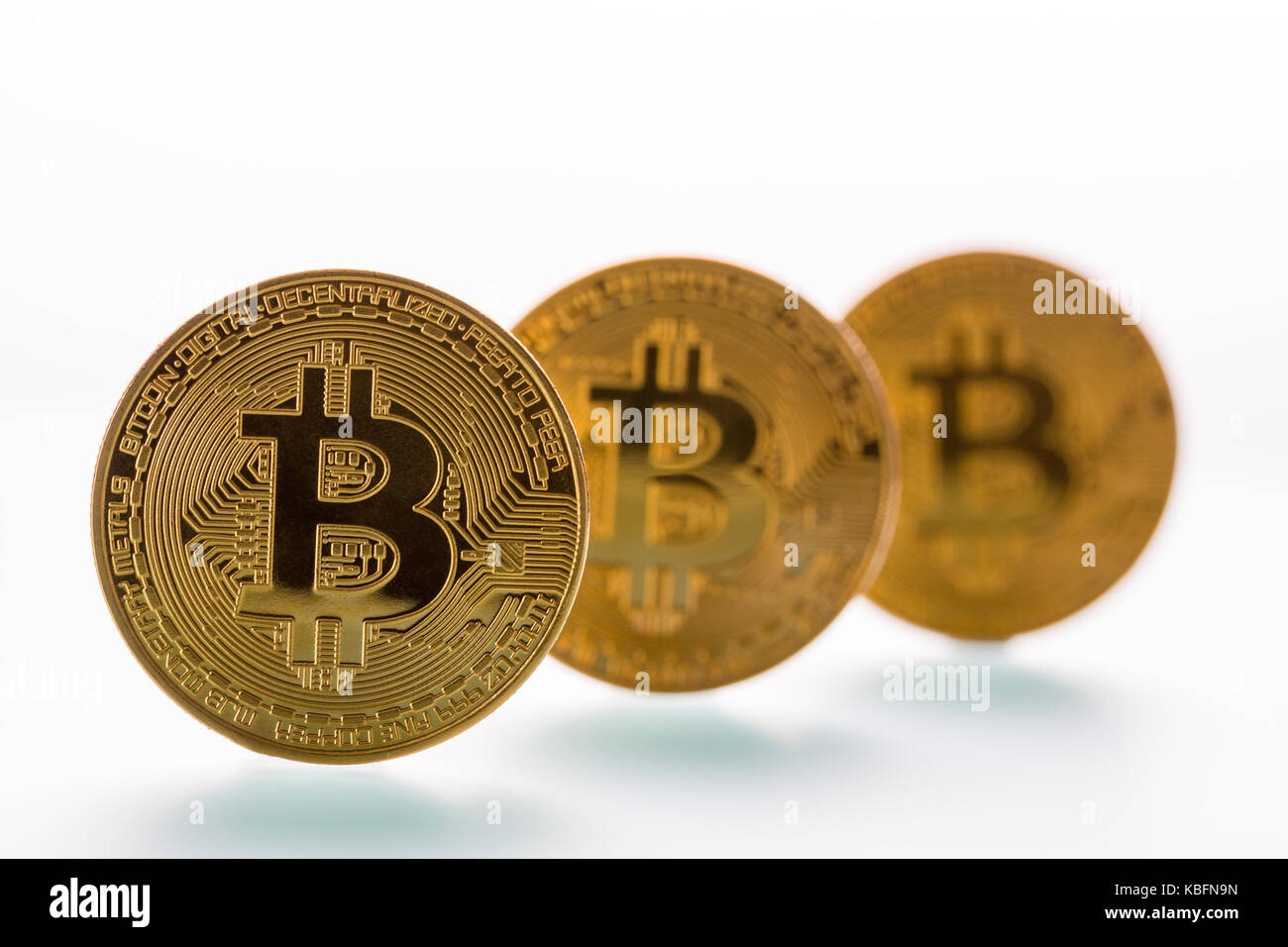 Isolated physical three coins of cryptocurrency bitcoin Stock Photo - Alamy