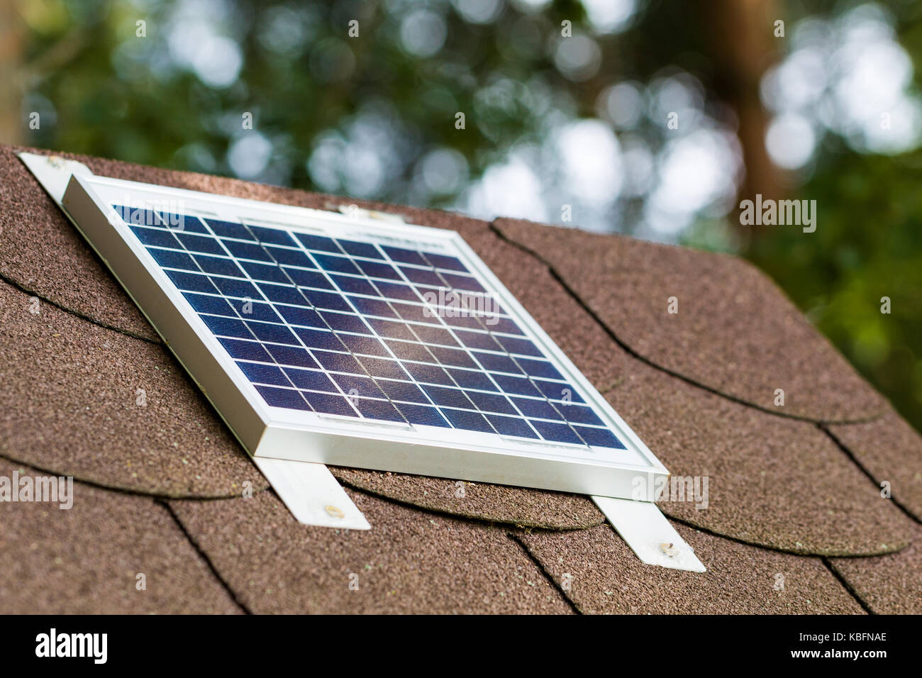 Small photovoltaic battery on bower roof, alternative energy Stock ...