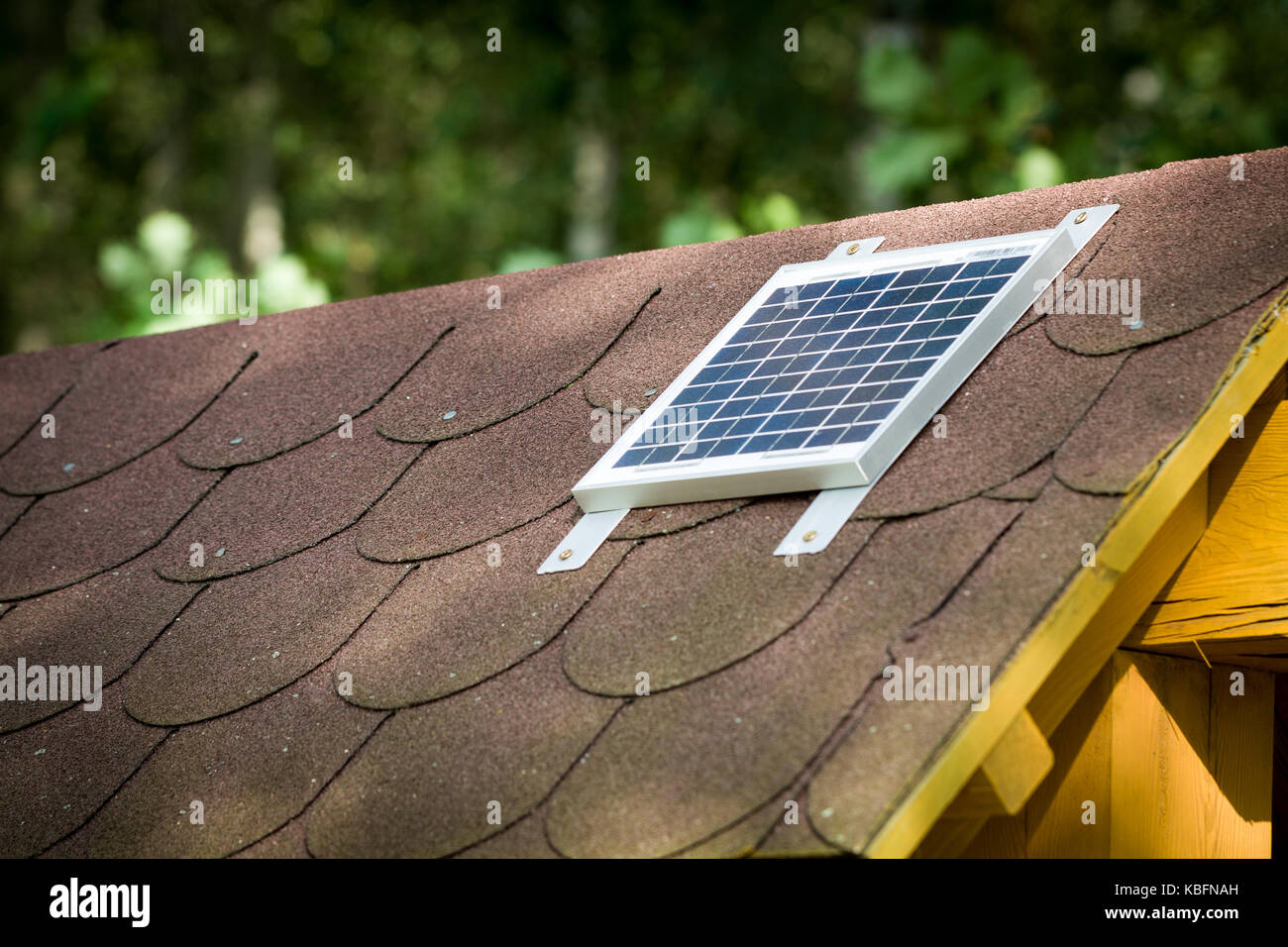 Small photovoltaic battery on bower roof, alternative energy Stock ...