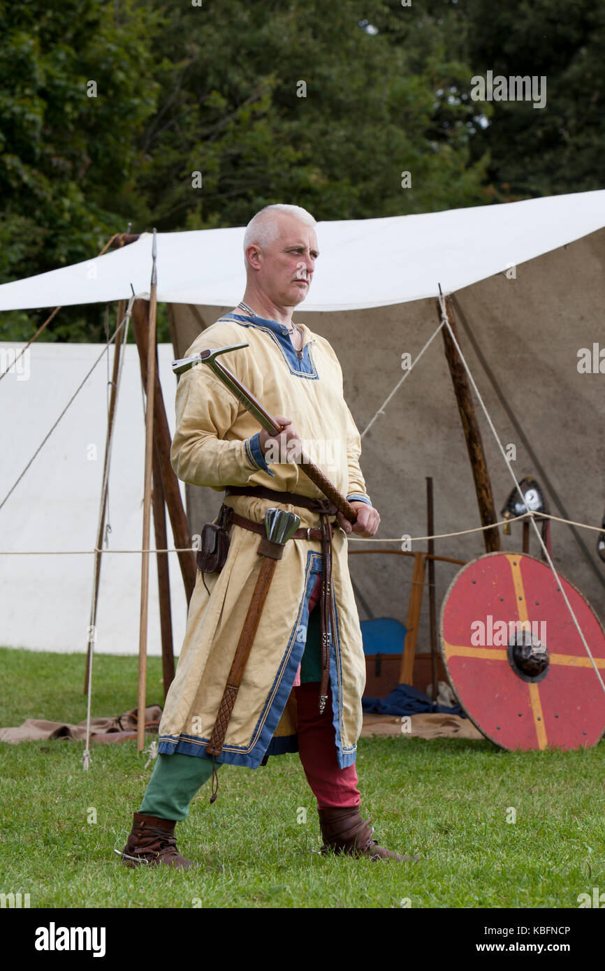 Norman soldier without body armour holding a war hammer at living ...
