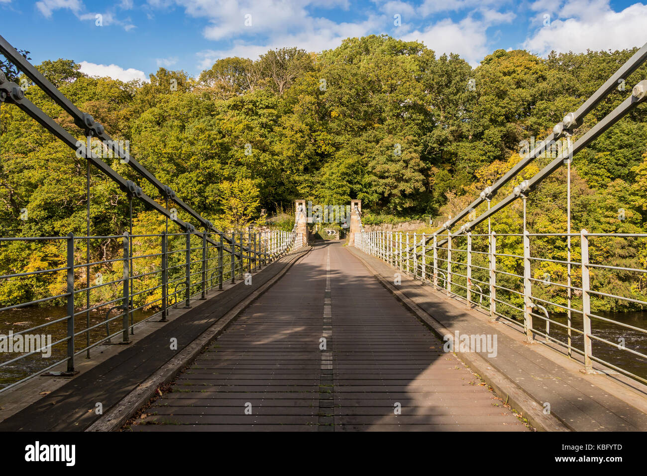The 19th Century suspension bridge over the river Tees at Whorlton ...
