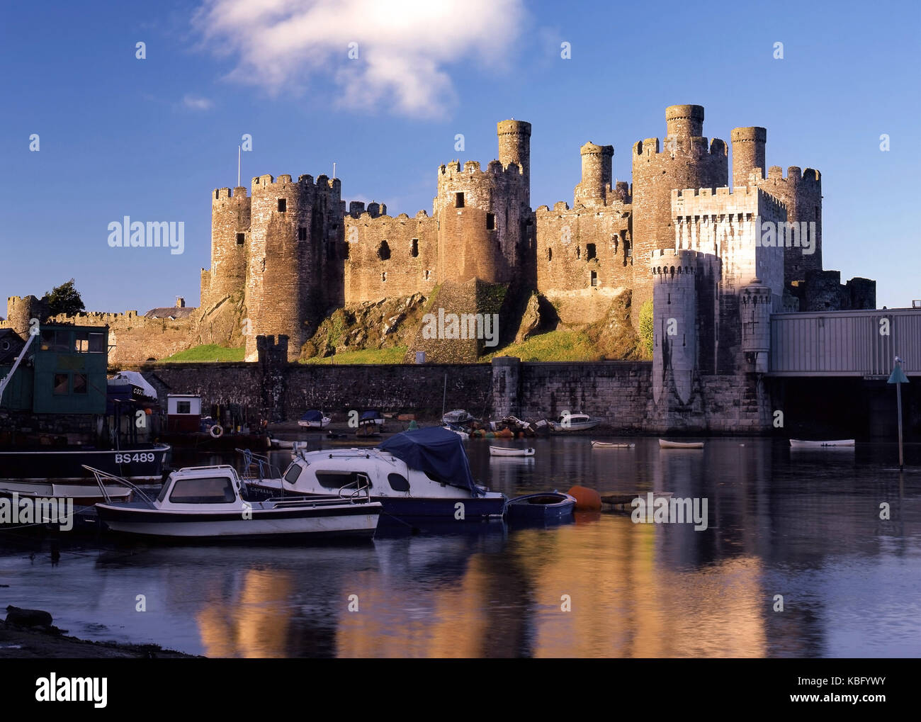 Looking across the calm waters of the River Conwy towards Conwy Castle ...