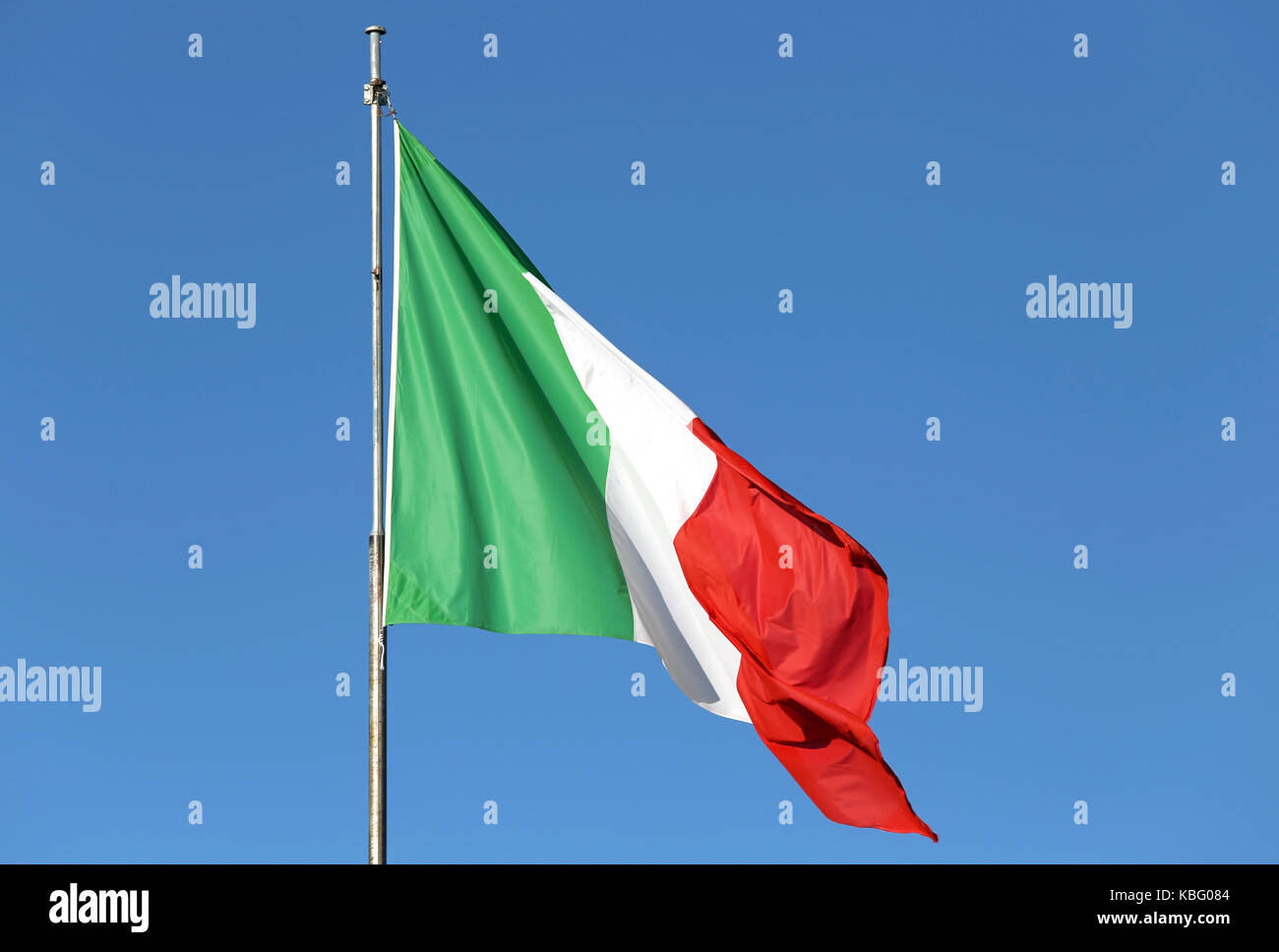 huge Italian flag waving with blue sky in the background Stock Photo ...