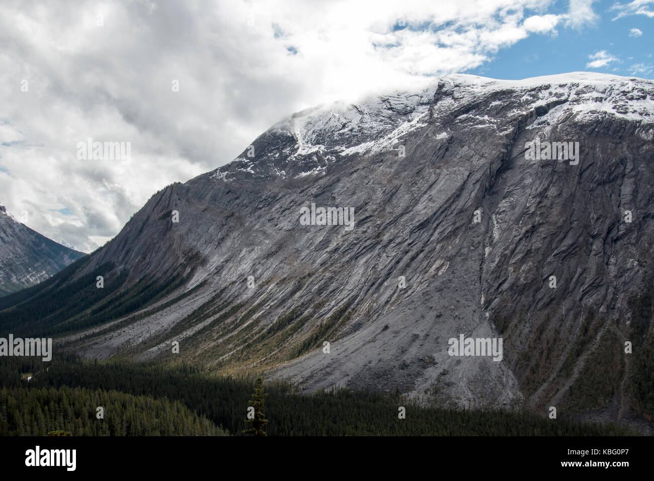 A dramatic and graceful mountain with a smoothly eroded side in Banff ...