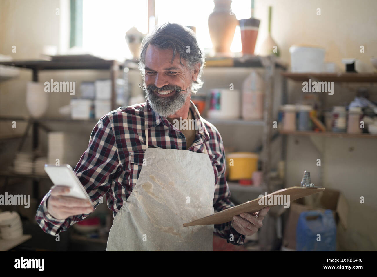 Happy potter hi-res stock photography and images - Alamy