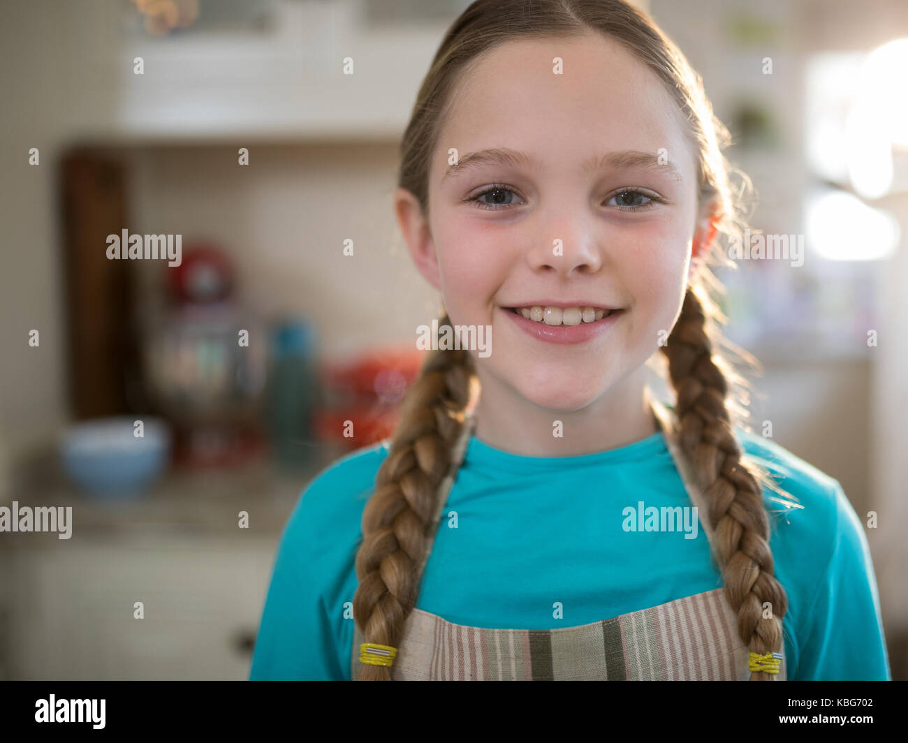 Portrait of young girl smiling at home Stock Photo - Alamy