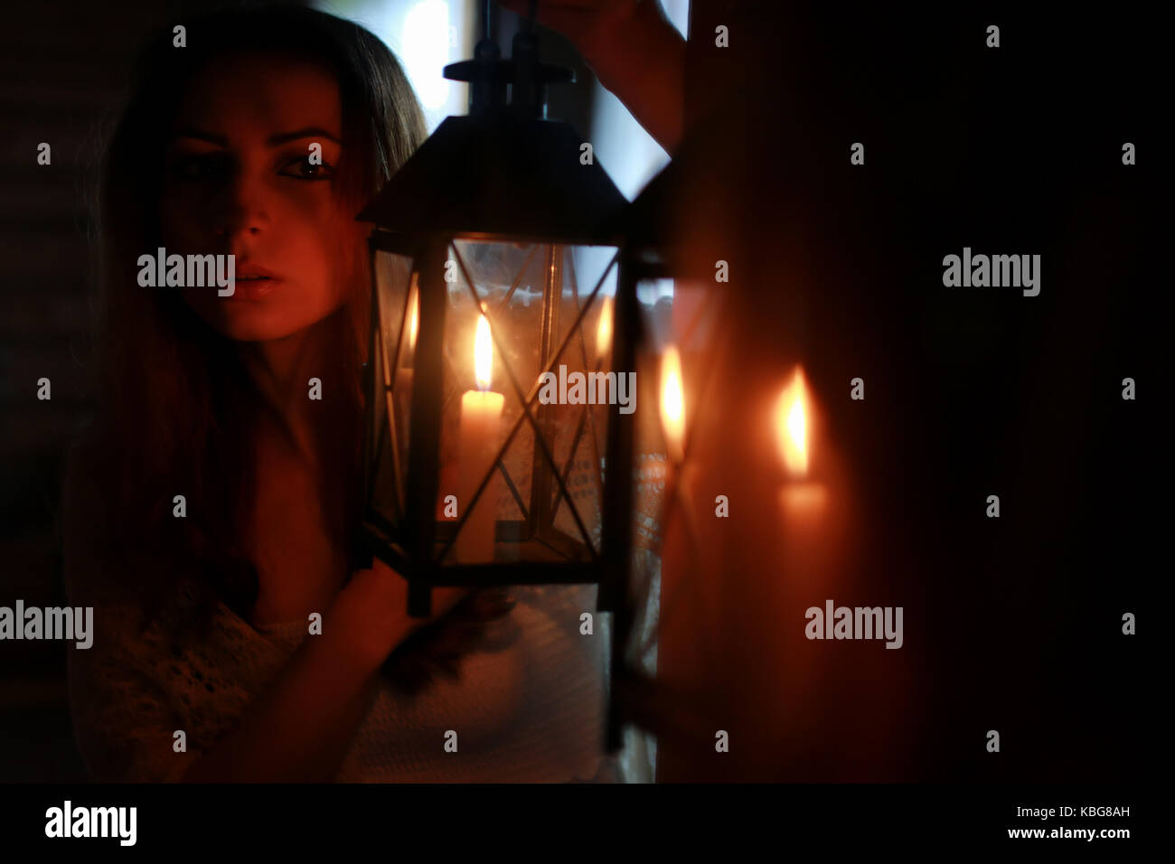 woman candle lamp dark night Stock Photo - Alamy